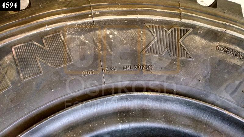 14.00R20 Michelin XZL 90%+ Tire on Combat Wheel - Oshkosh Equipment